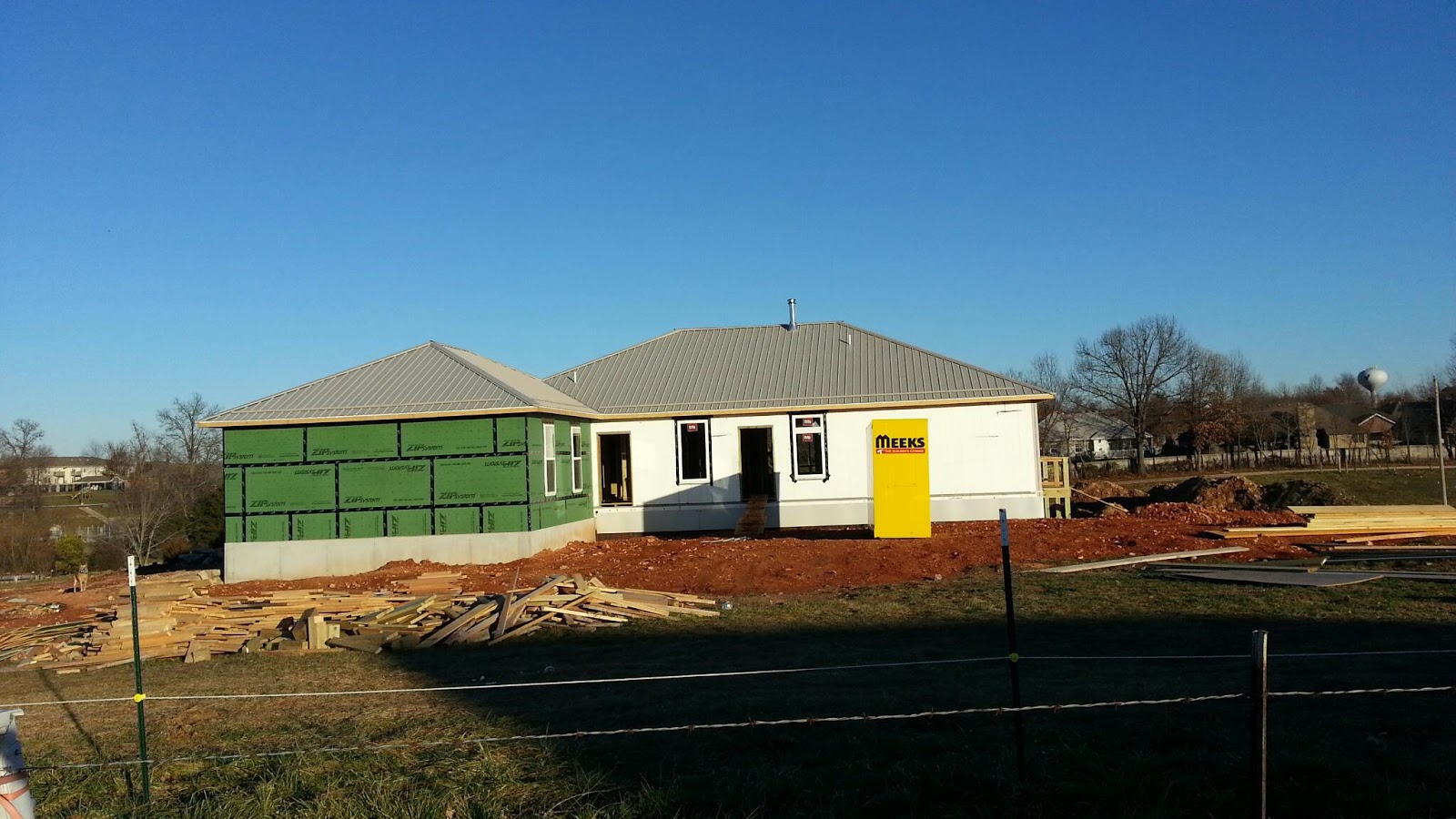 Insulated Concrete Forms TF Systems house: The metal roof is on