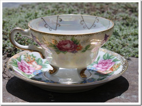 Three footed tea cup…