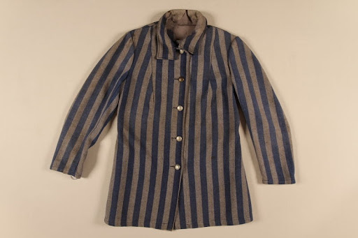 Blue and gray striped concentration camp uniform jacket worn by a ...