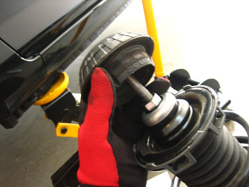 MOT fail: MacPherson strut has excessive movement at the upper attachment