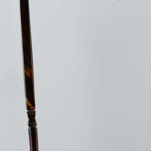 Lorgnet met montuur van schildpad of celluloid op lang achthoekig ...