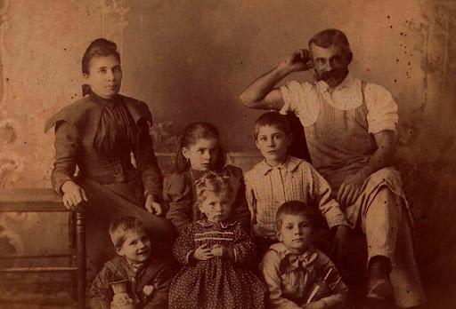 George Ohr with family - Unknown Photographer — Google Arts & Culture