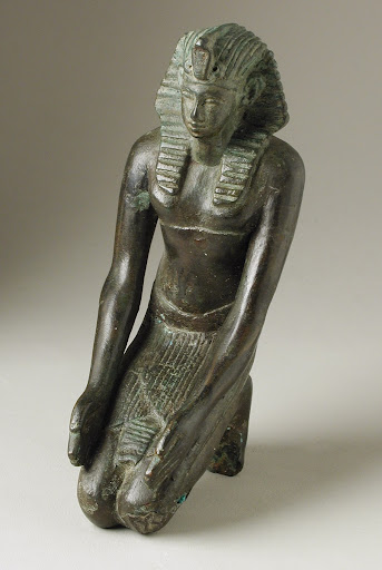 Figure of a Kneeling King - Unknown — Google Arts & Culture